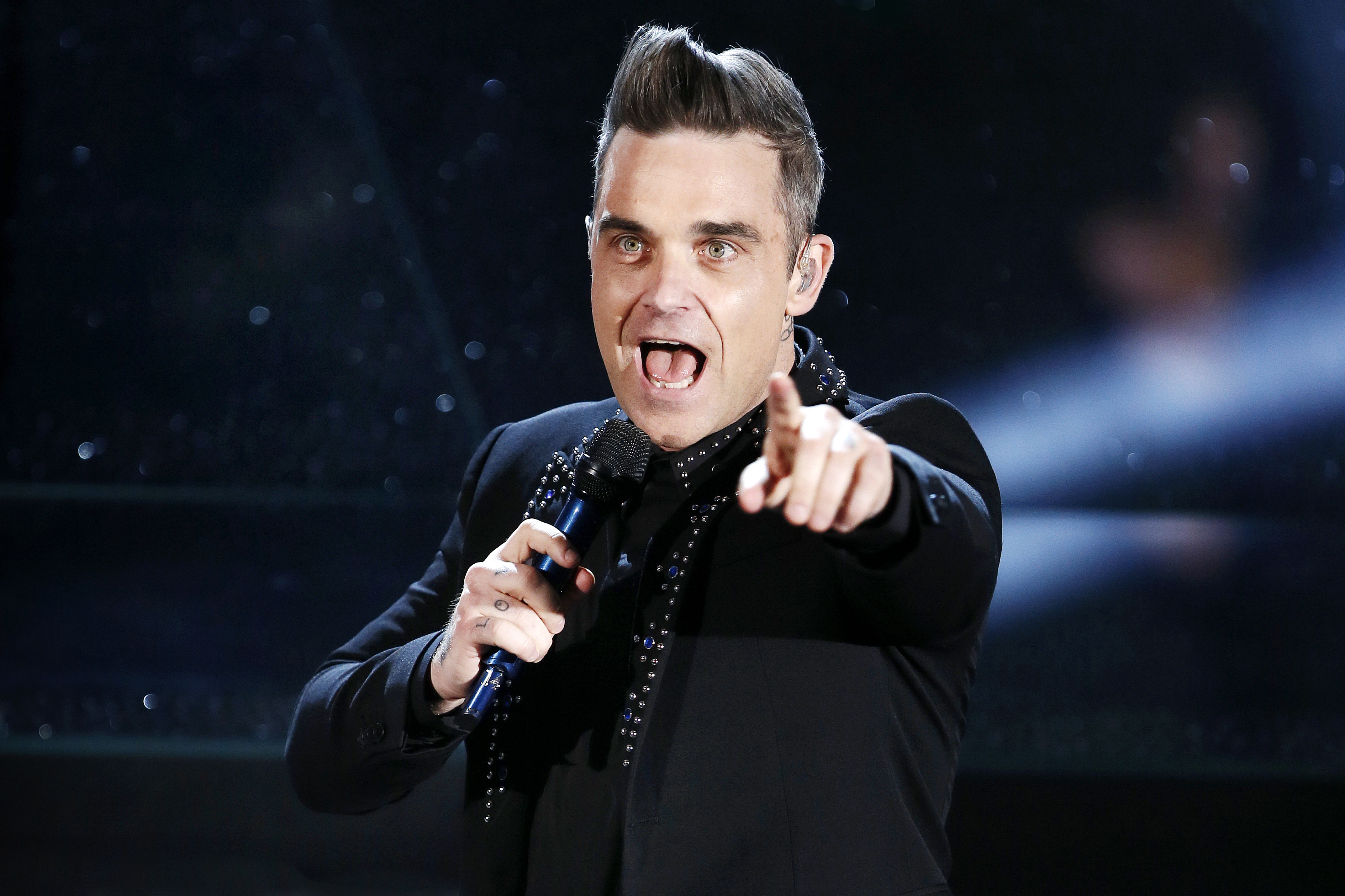 Robbie Williams kündigt Tour 2025 an, die den gleichen Namen wie das ...